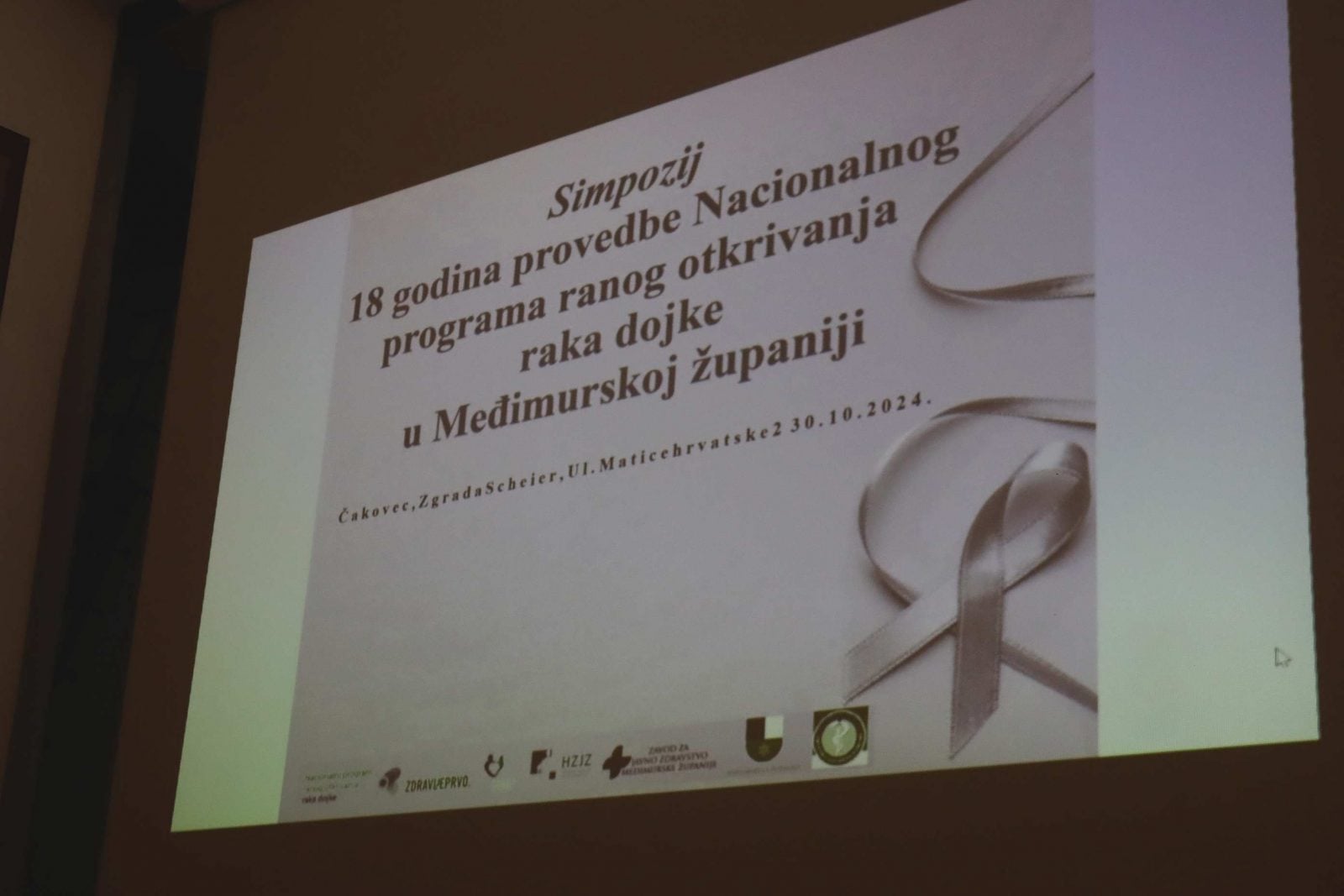 Simpozij o raku dojke